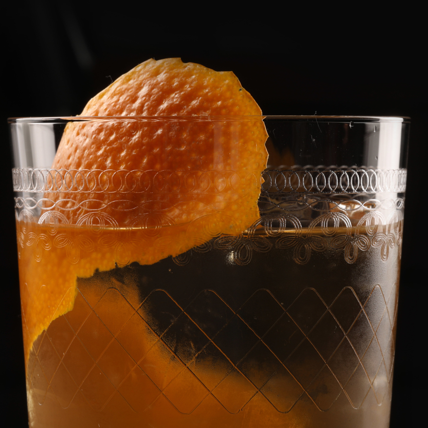 How to express a citrus zest twist over a cocktail